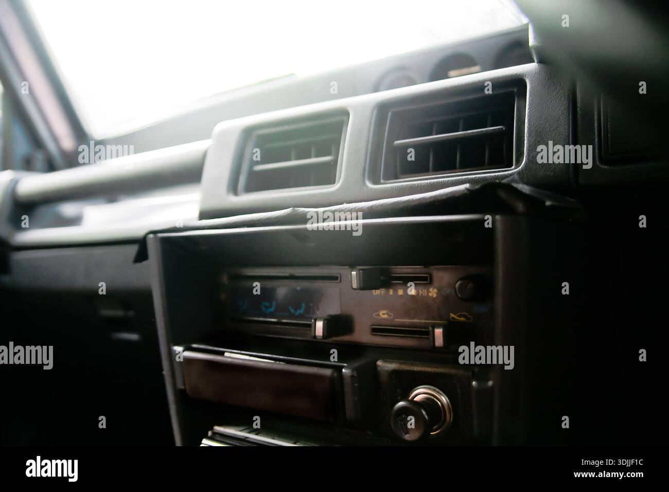 close up of air ventilation and AC control panel on dashboard old car ...