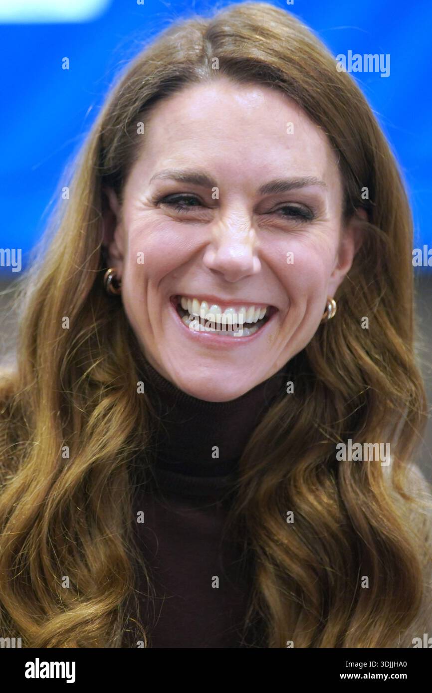 Britain's Kate, Princess of Wales laughs during a visit to Wakefield ...