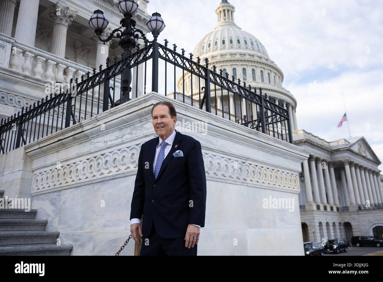 Rep. Vern Buchanan (R-Fla.) stands as an aide photographs him outside ...