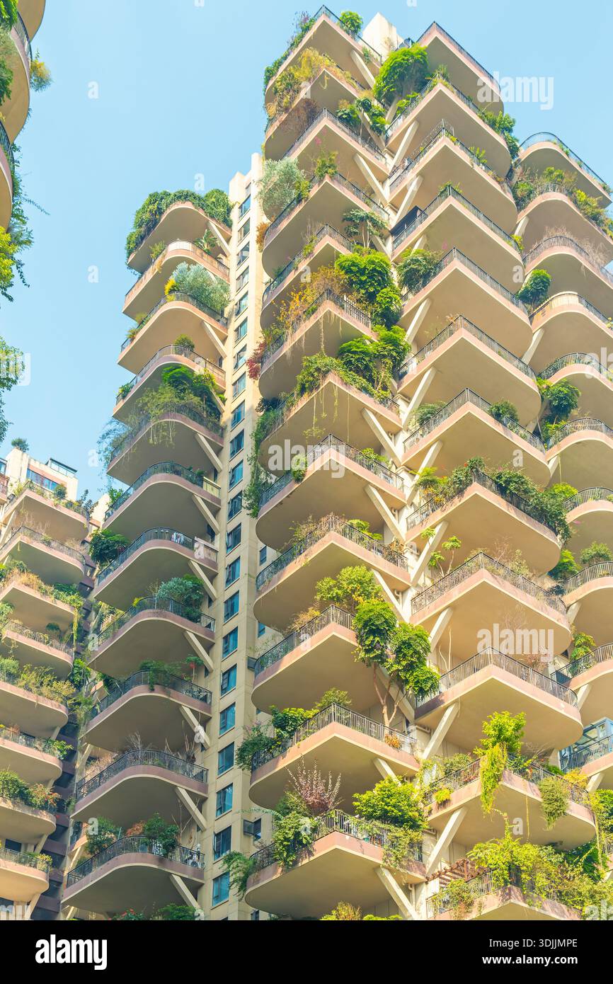 Vertical garden, green architecture. Modern residential building with ...