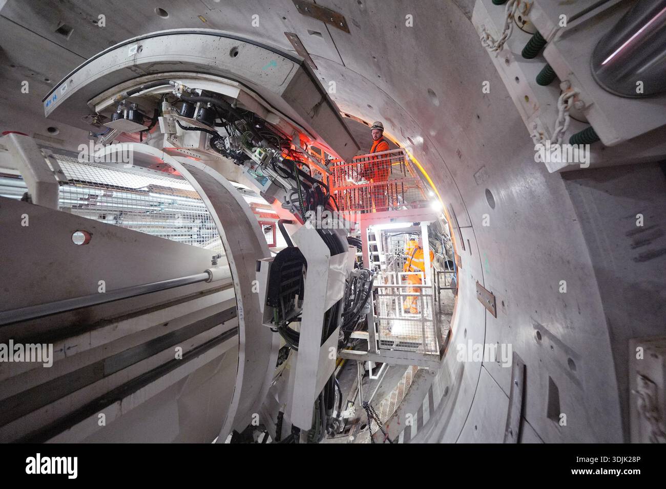 An engineer working on the ring build area - where segments are ...