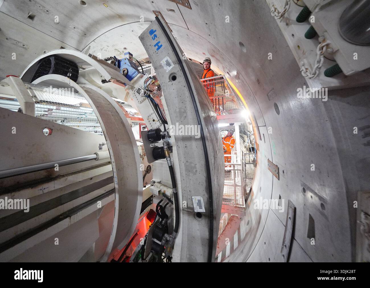 An engineer working on the ring build area - where segments are ...