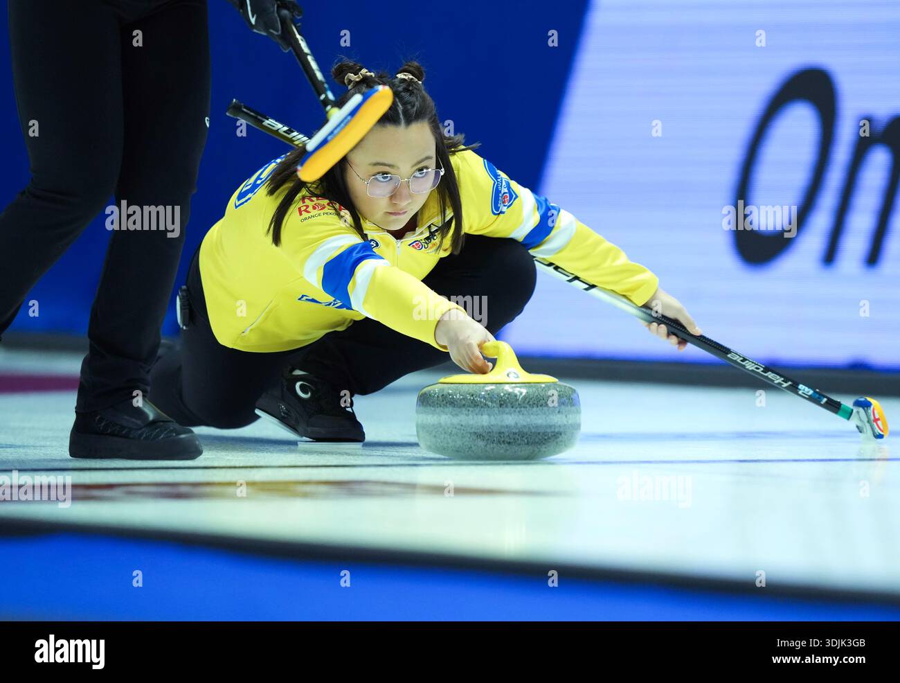 Team Alberta Skip Kayla Skrlik throws her rock down ice while competing ...