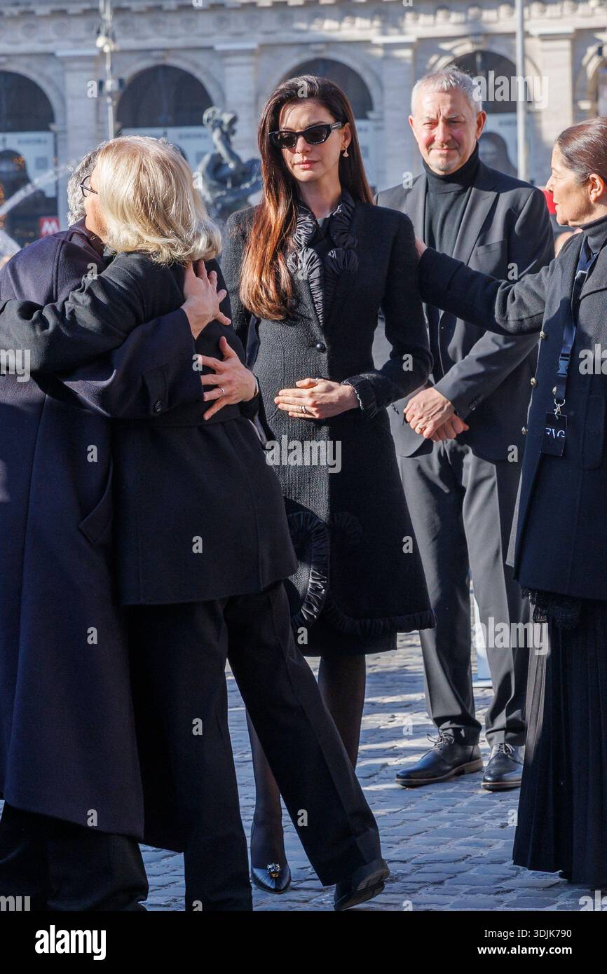 1/23/2026 Anne Hathaway arrives at the Valentino Garavani's funeral at ...