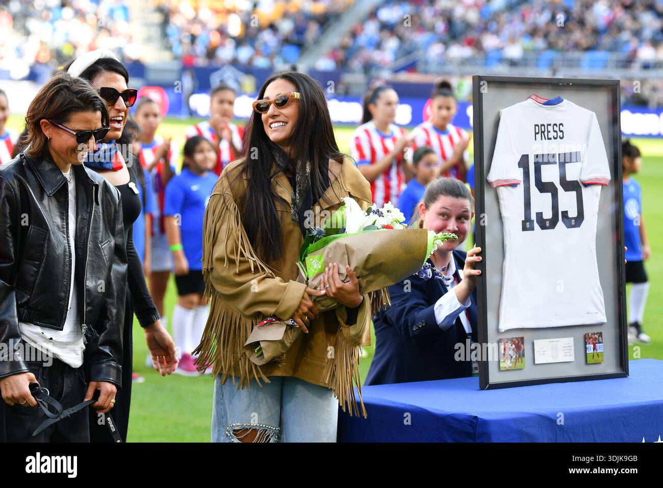 CARSON, CA - JANUARY 24: Christen Press is honored as her girlfriend ...