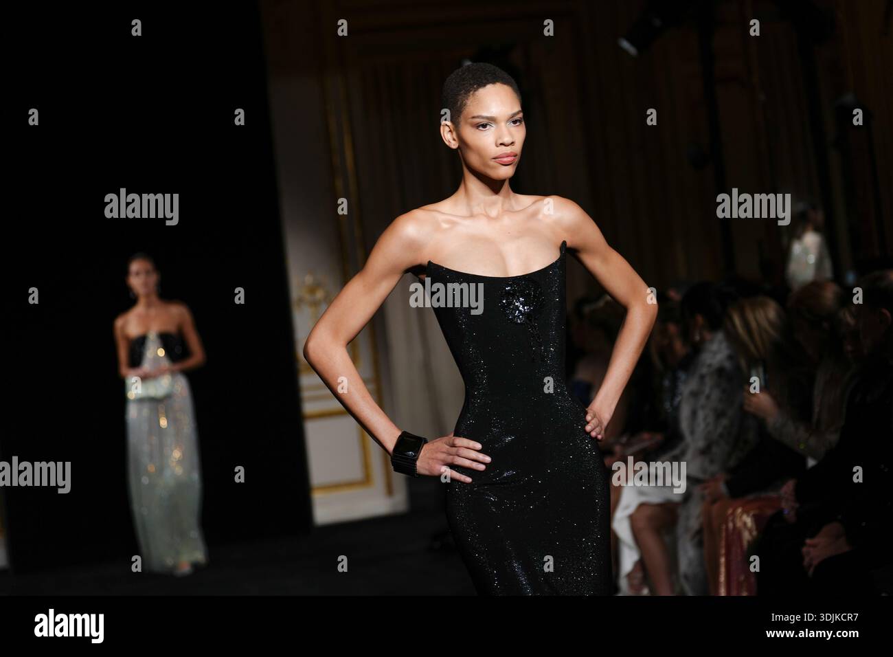 A model wears a creation as part of the Giorgio Armani Prive Spring ...