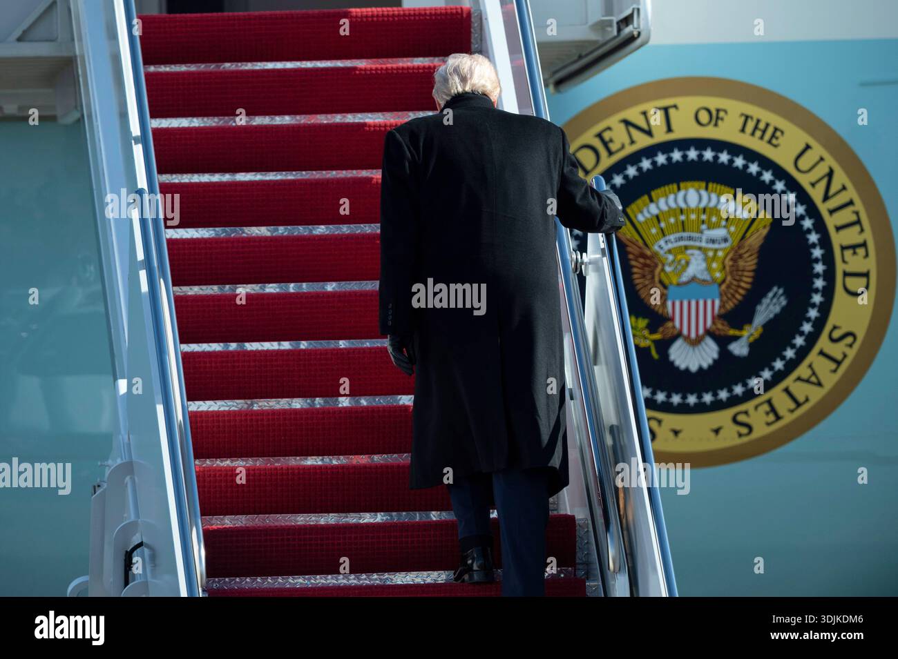 President Donald Trump boards Air Force One at Joint Base Andrews, Md ...