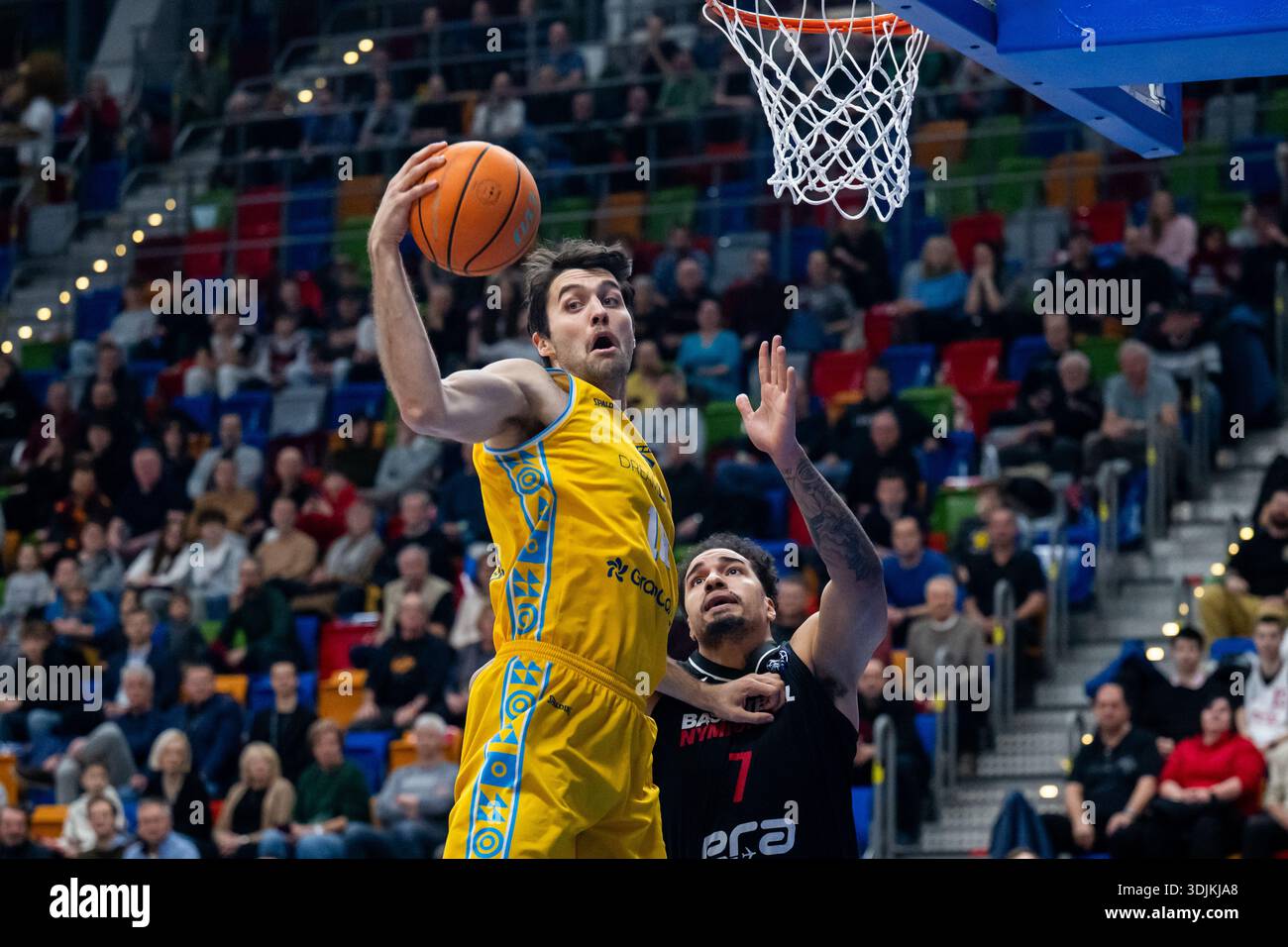 Mike Tobey of Gran Canaria, left, and Marcus Santos Silva of Nymburk in ...