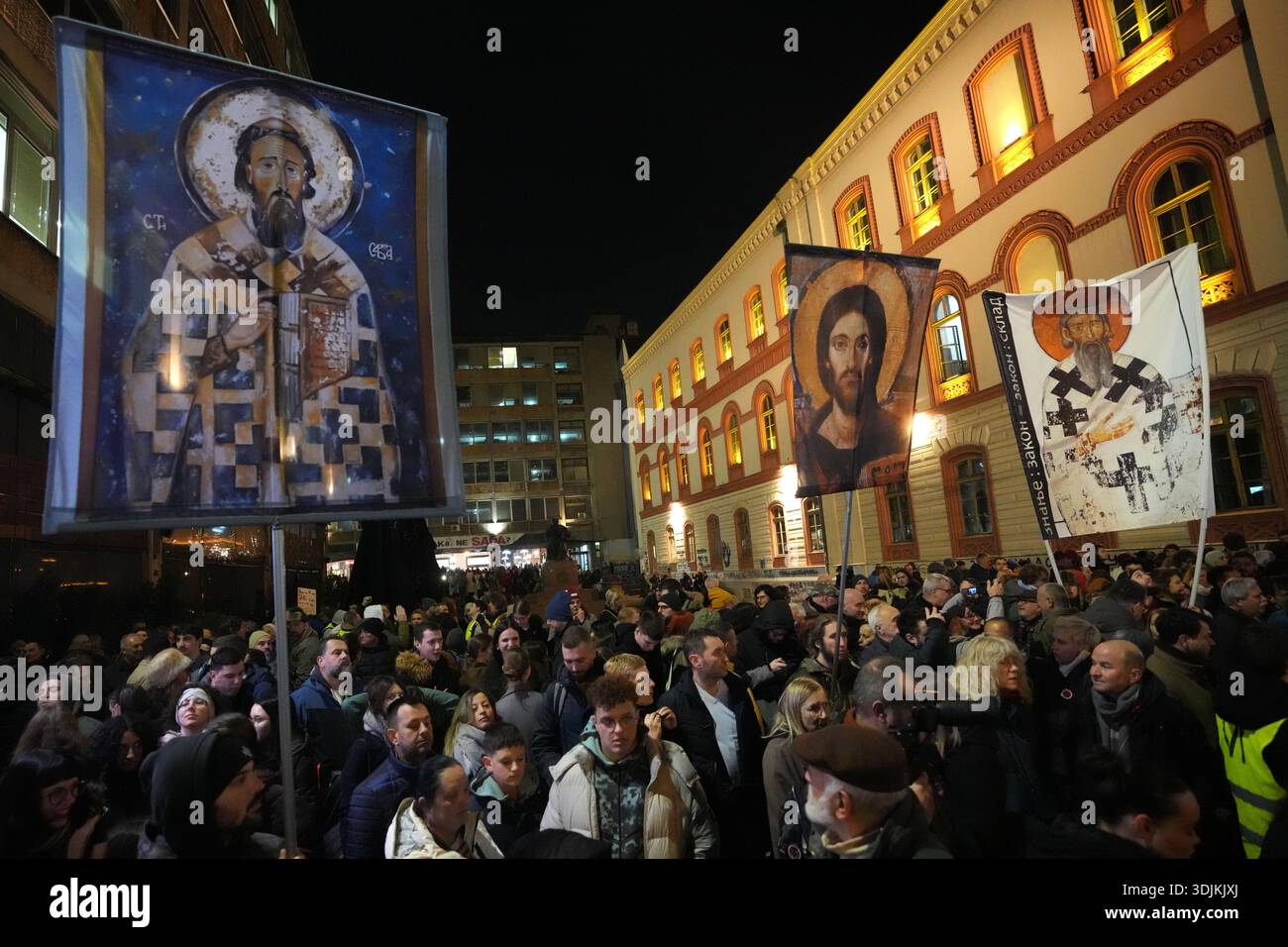 People attend a protest against a government crackdown on universities ...