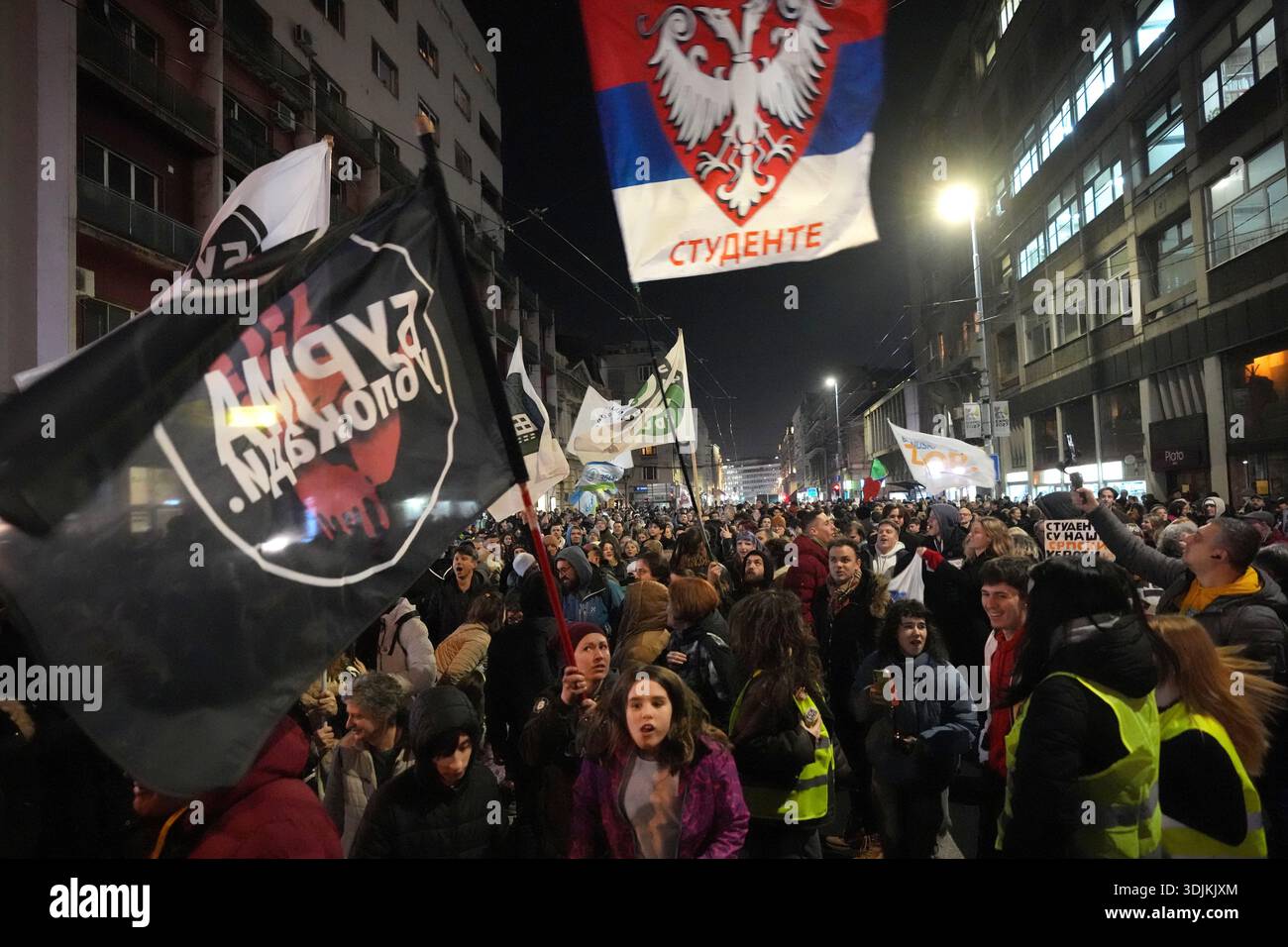 People attend a protest against a government crackdown on universities ...