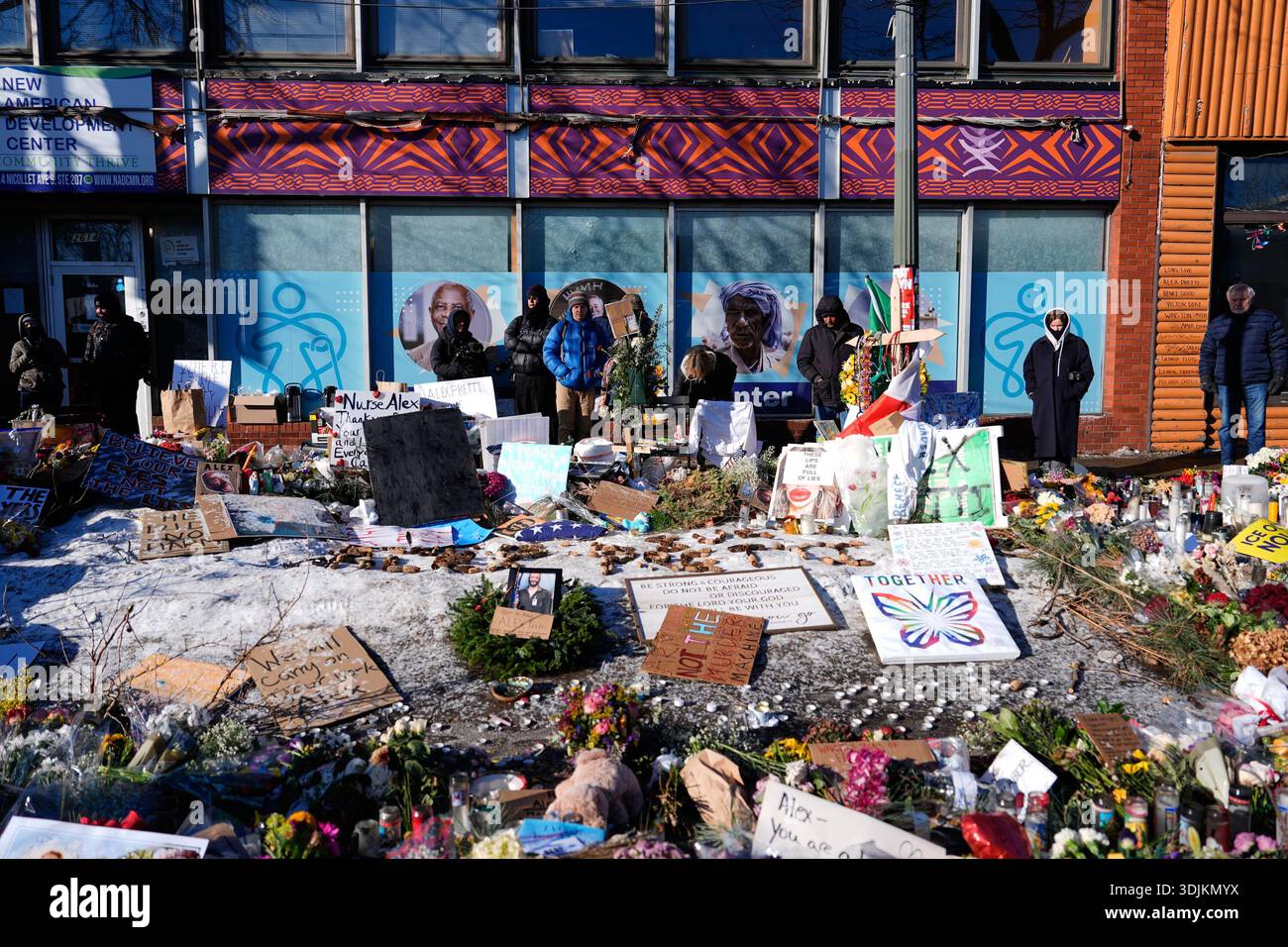 People visit a memorial for Alex Pretti at the scene where the 37-year ...