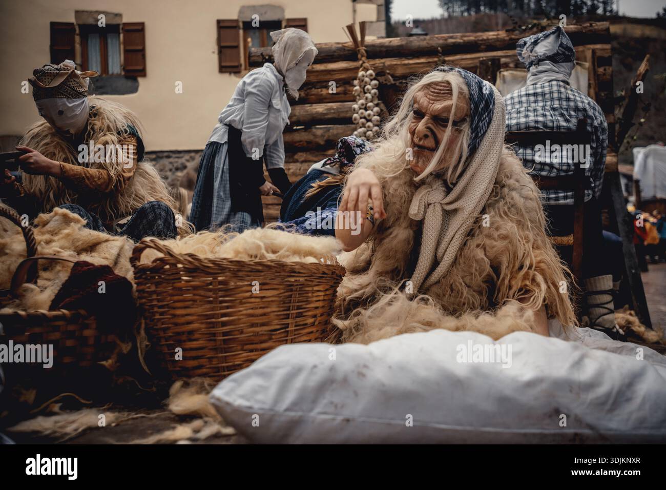 Zubieta, Spain. 27 January, 2026: Revelers wearing grotesque masks ...