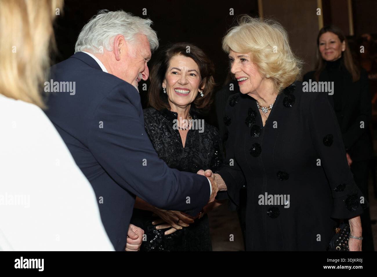 Queen Camilla meets meets producer Laurie Borg as she attends a special ...