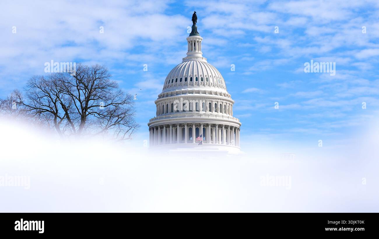 The U.S. Capitol is photographed beyond the snow, Tuesday, Jan. 27 ...