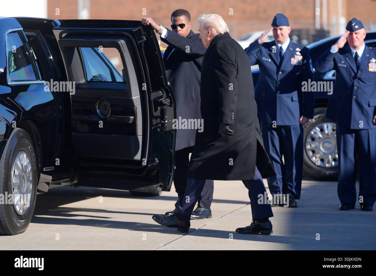 President Donald Trump gets into a vehicle after his arrival at Des ...