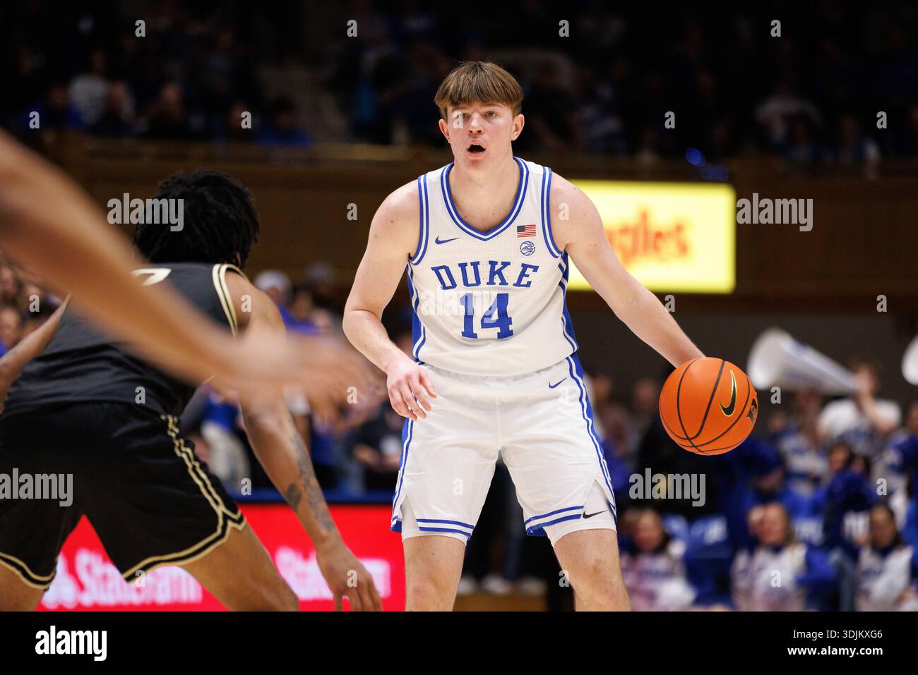 Duke's Nikolas Khamenia (14) handles the ball during an NCAA college ...