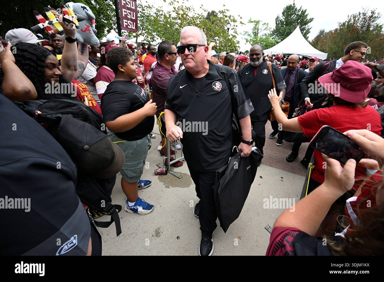 Florida State offensive line Herb Hand coach Chris Thomsen, center ...