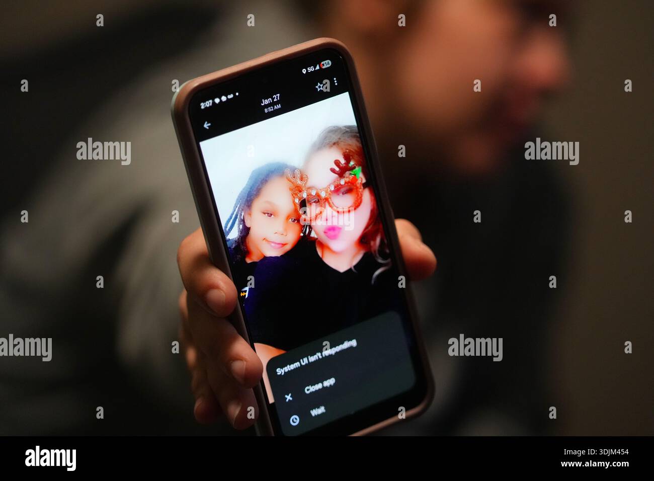 Cheyenne Hangaman shows a photograph of her and her son, Kaleb, 8, who ...