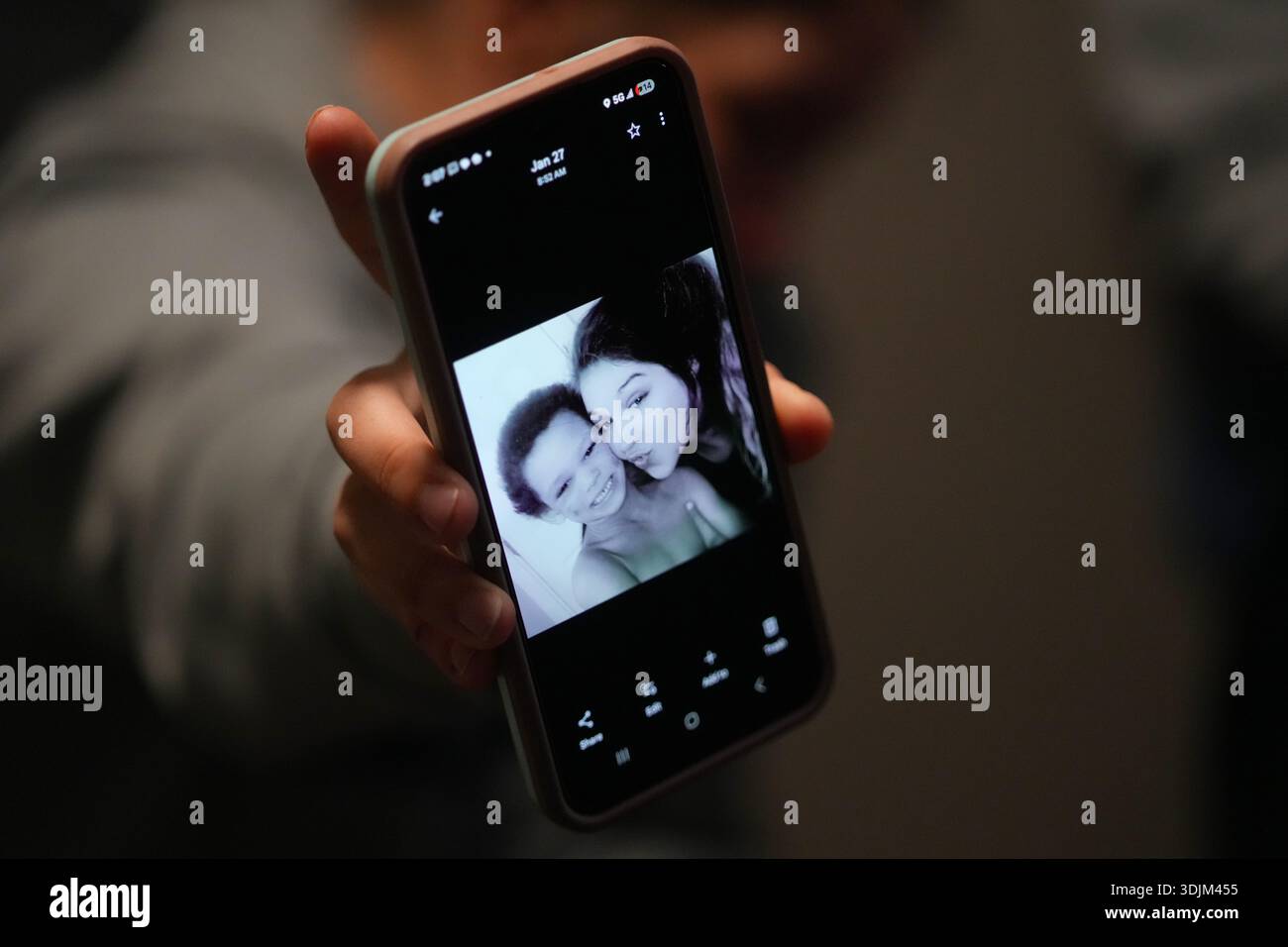 Cheyenne Hangaman shows a photograph of her and her son, Howard, 6, who ...