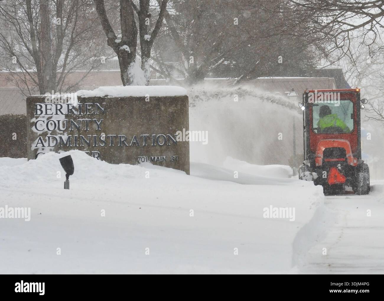 Snow removal work continues Tuesday, Jan. 27, 2026, in front of the ...