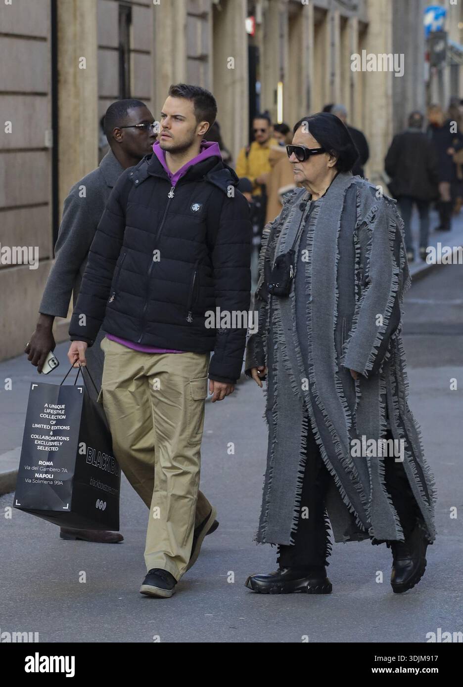 Rome; the Roman singer Renato Zero, walks accompanied by his assistant ...