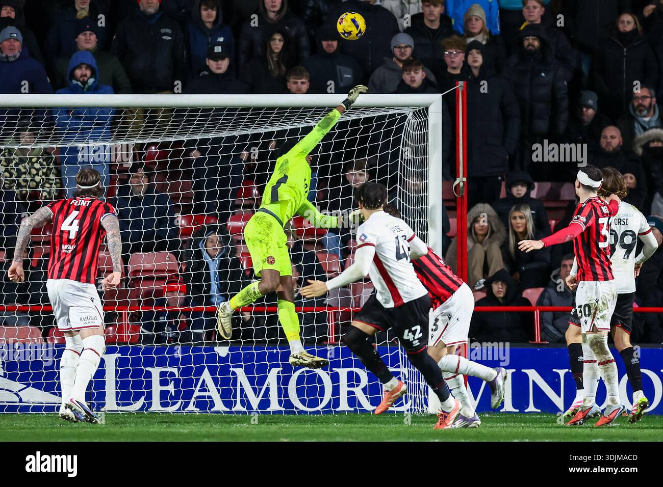1, Myles Roberts of Walsall FC tips the ball over the bar during the ...