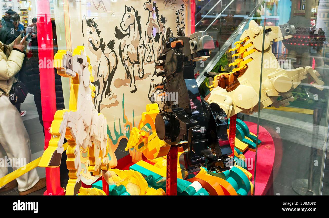 SHANGHAI, CHINA - JANUARY 27, 2026 - A set of horse themed toys made of ...