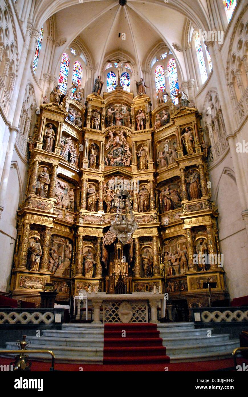 Elaborate Baroque church altar featuring gilded religious sculptures ...