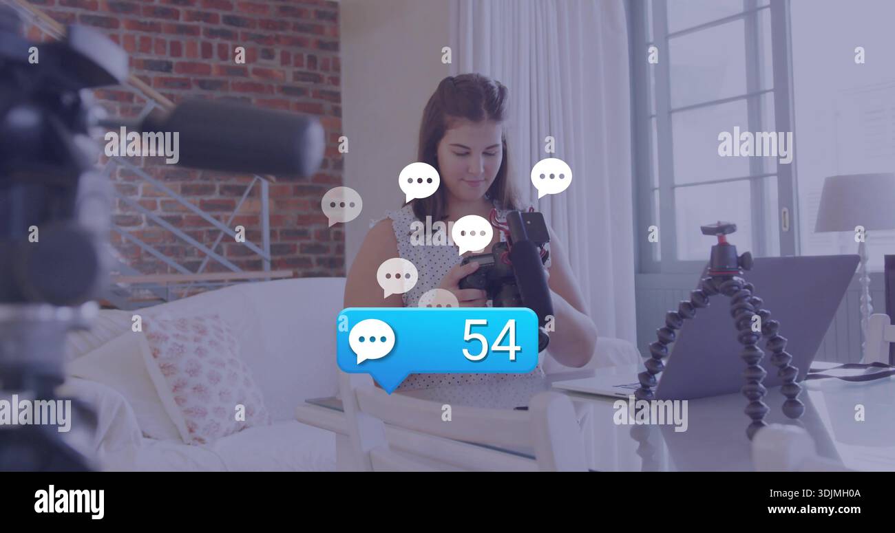 Adjusting creator wearing sleeveless blouse testing DSLR camera in home ...