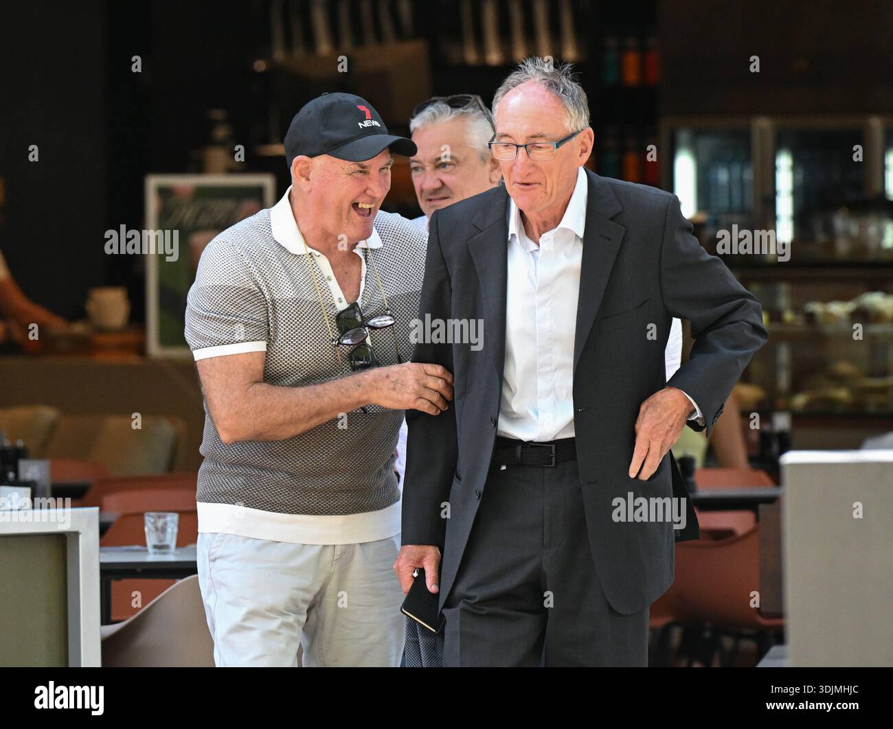 Former Sydney Roosters Rugby League captain John Tobin (right) arrives ...