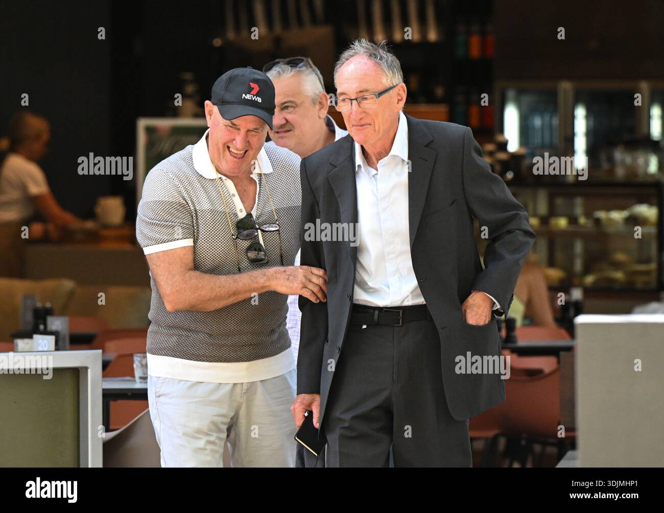 Former Sydney Roosters Rugby League captain John Tobin (right) arrives ...