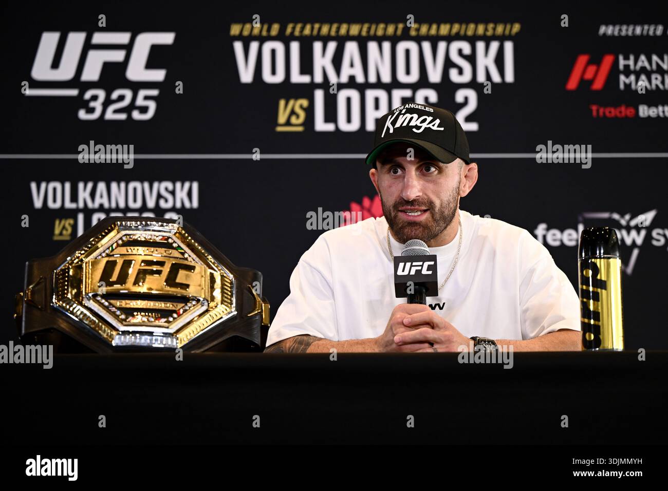 UFC featherweight champion Alexander Volkanovski peaks to media during ...