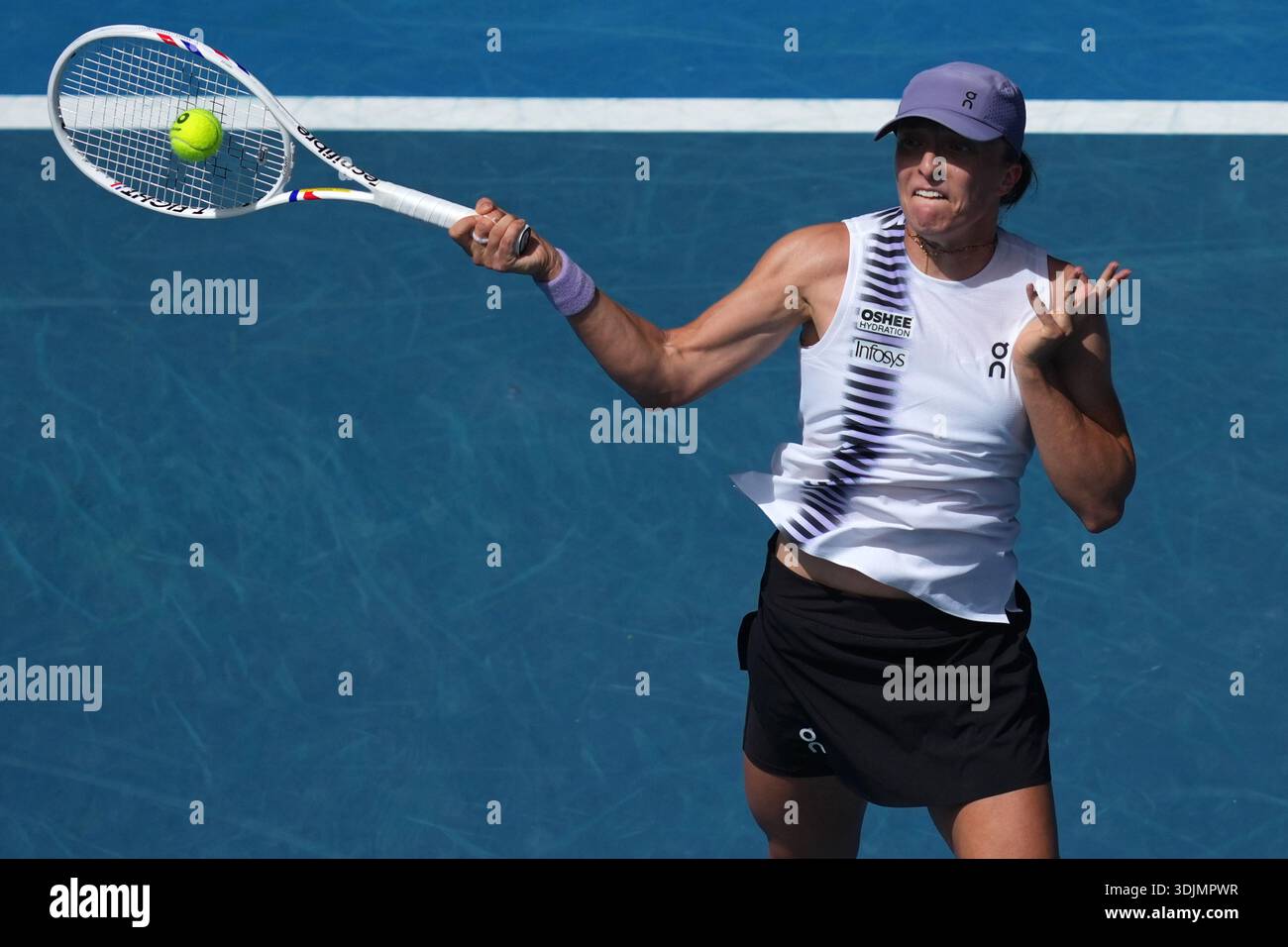 Iga Swiatek of Poland plays a forehand return to Elena Rybakina of ...