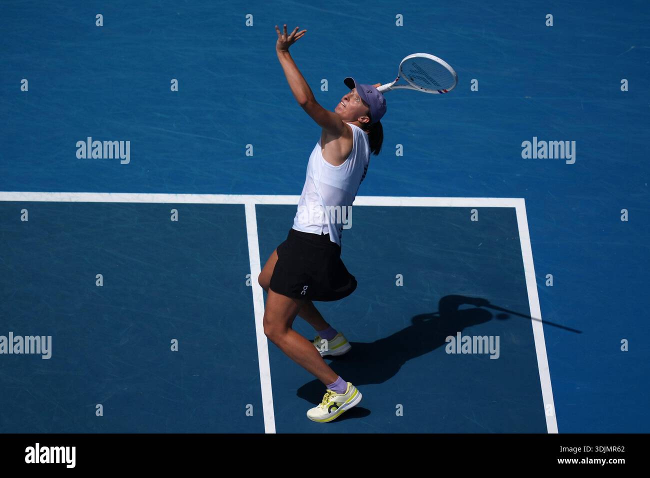 Iga Swiatek of Poland plays a forehand return to Elena Rybakina of ...