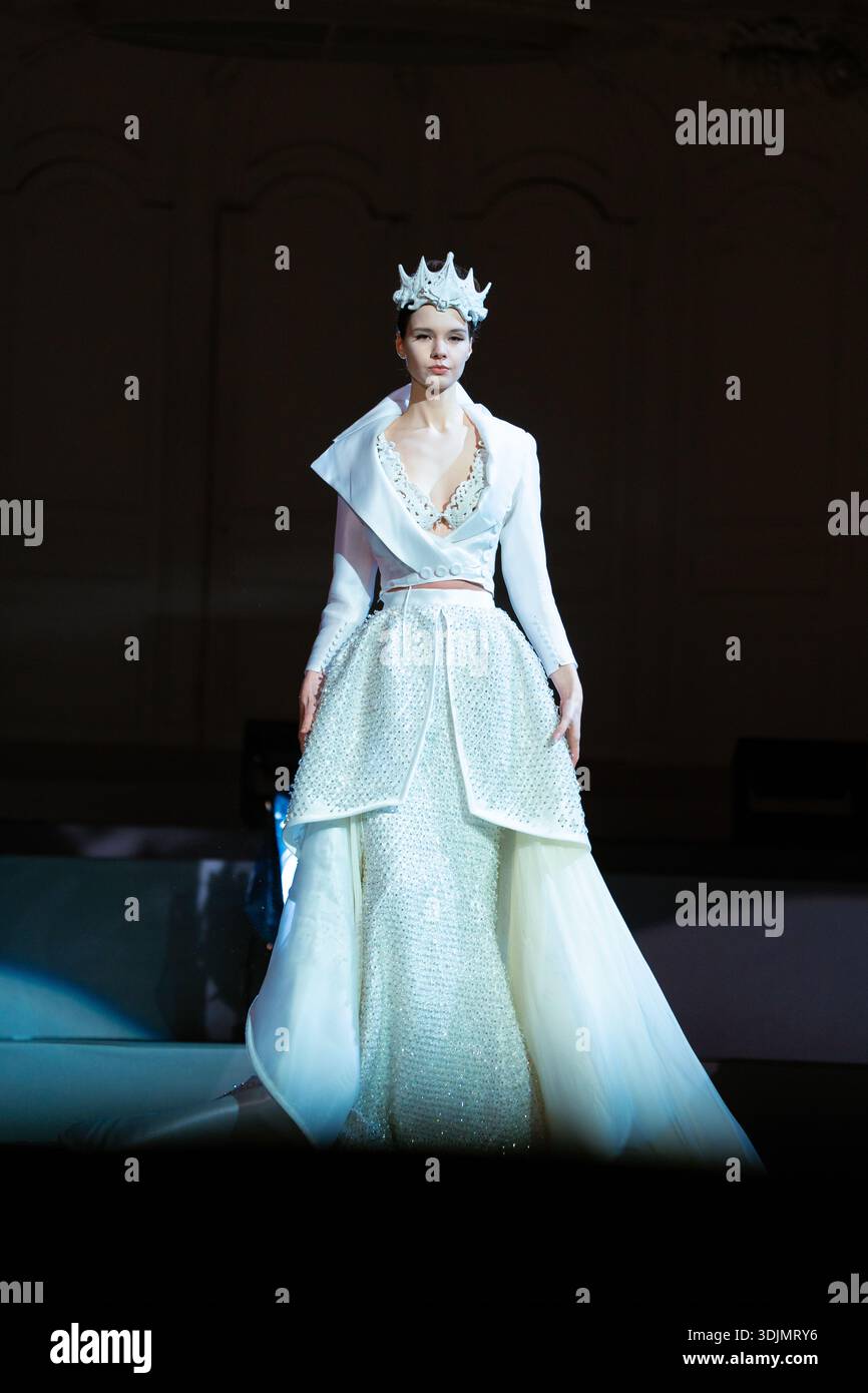 A model walks the runway during the Julien Fournié Haute Couture Week ...