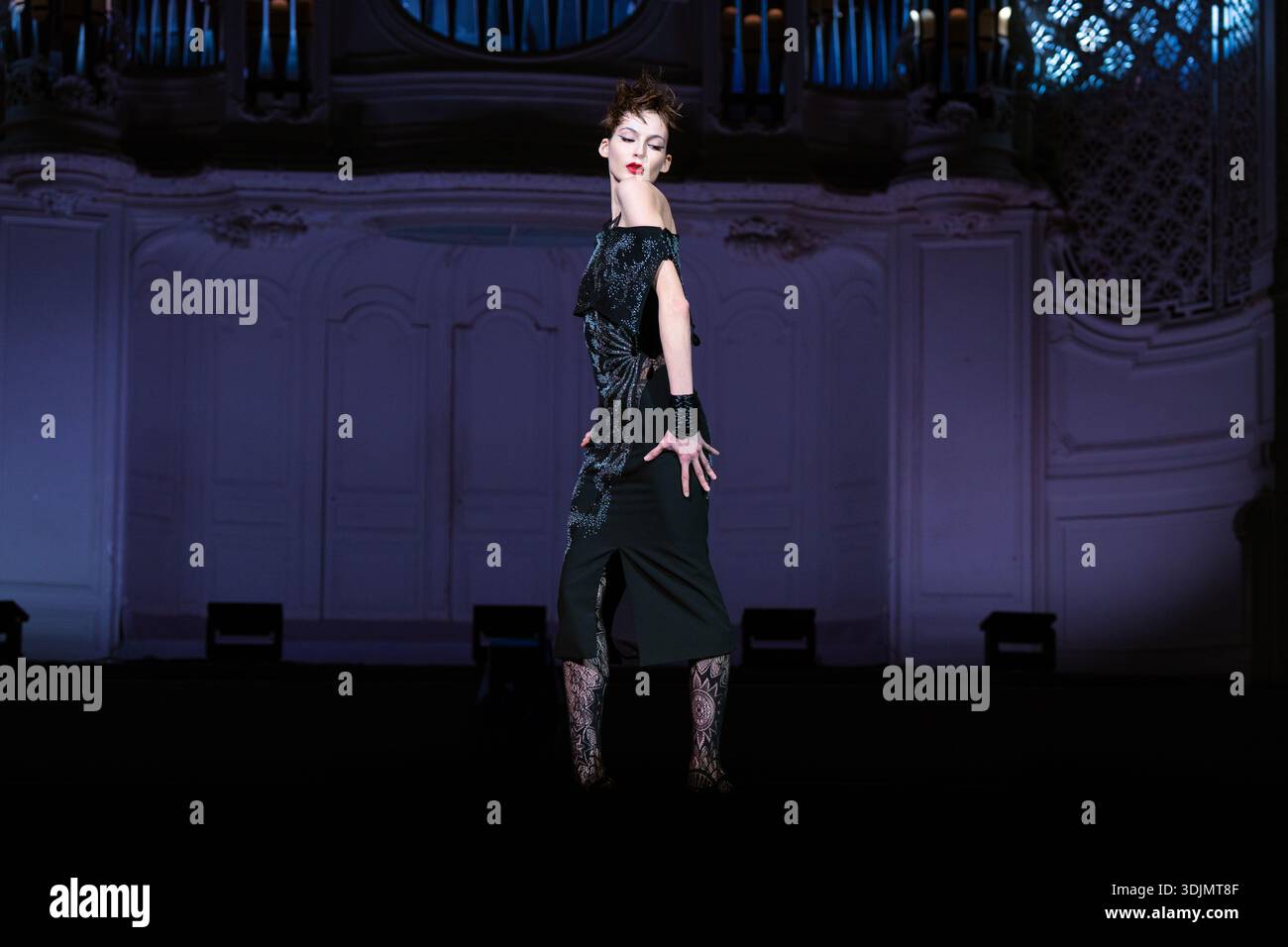 A model walks the runway during the Julien Fournié Haute Couture Week ...