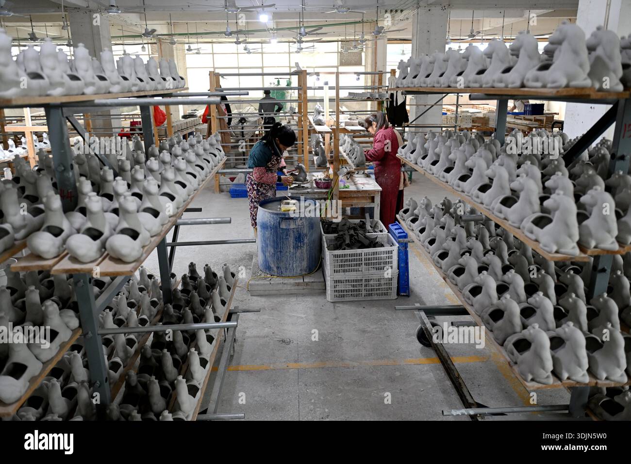**CHINESE MAINLAND, HONG KONG, MACAU AND TAIWAN OUT** Craftsmen create ...