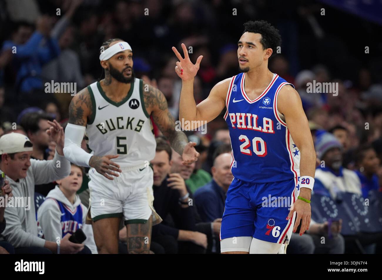 Philadelphia 76ers' Jared McCain reacts during an NBA basketball game ...