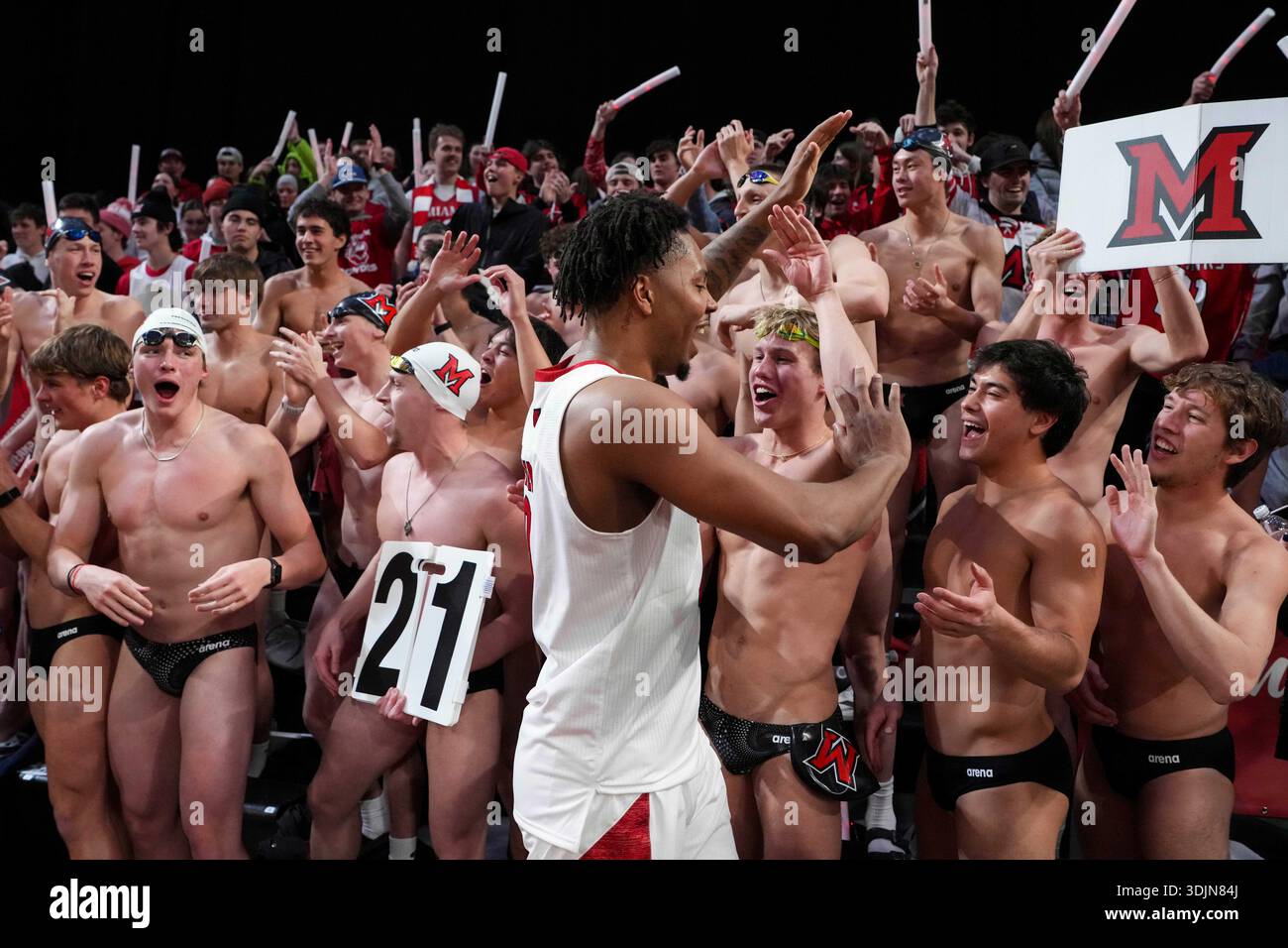 Miami (OH) forward Eian Elmer, center, celebrates with fans following ...