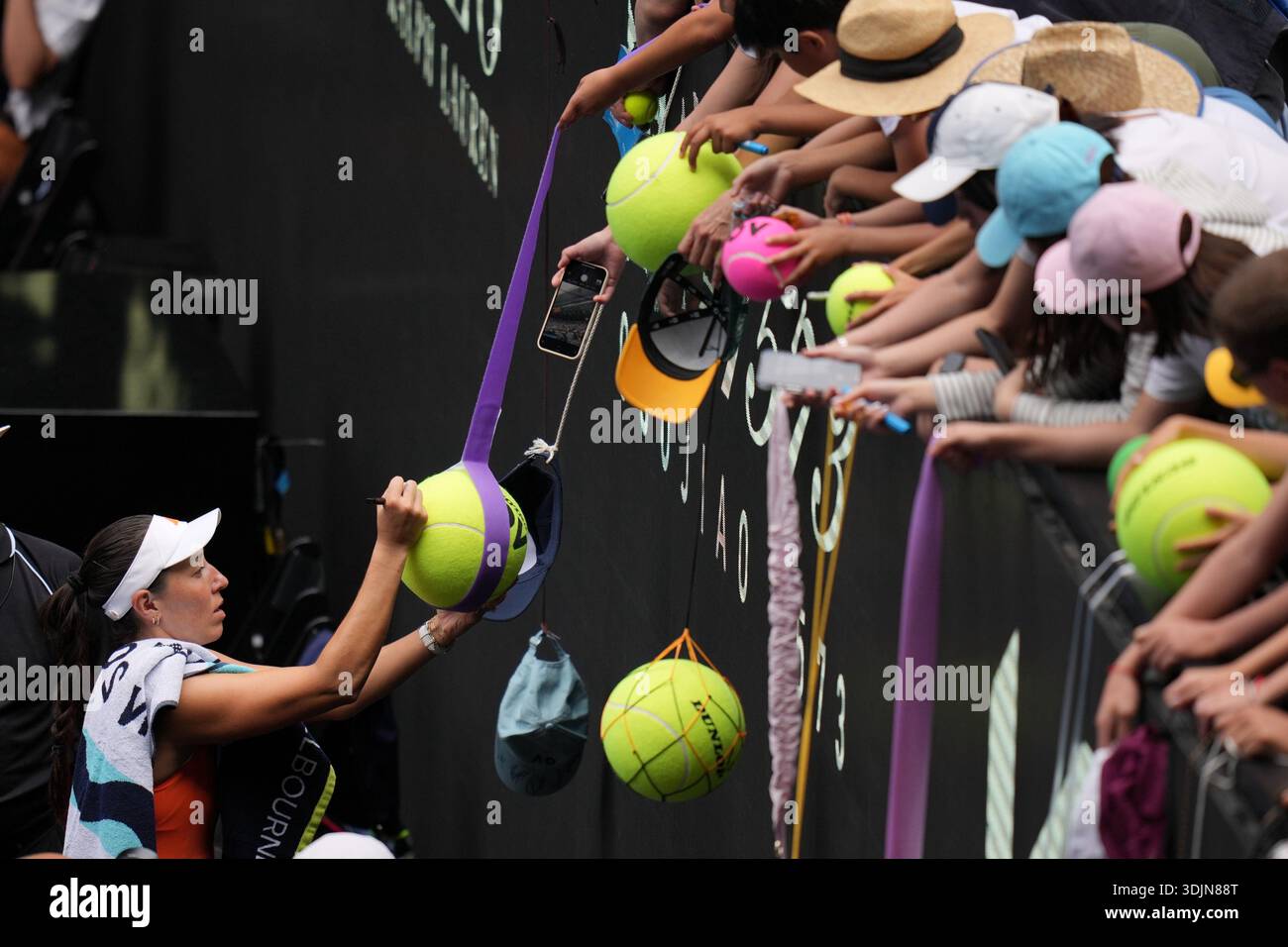 Jessica Pegula of the U.S. signs autographs after defeating compatriot ...