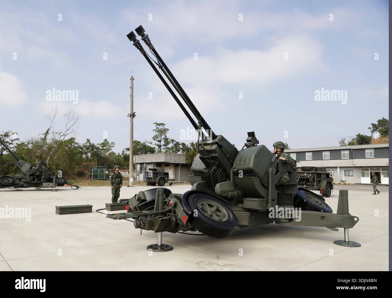 Soldiers conduct a practice operation of a GDF-006 AHEAD 35 mm twin ...
