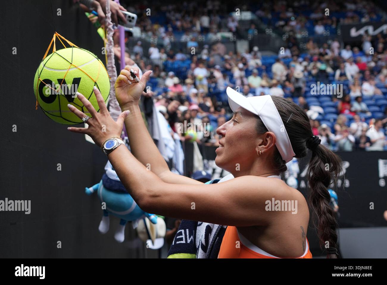 Jessica Pegula of the U.S. signs autographs after defeating compatriot ...