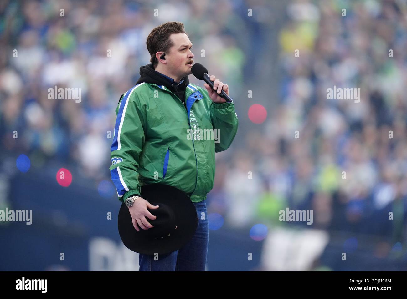 Country music singer Zach Top performs the national anthem during the ...
