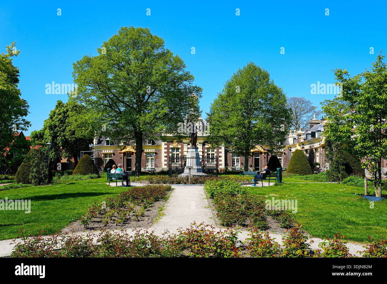 The historic De Zeenymph statue in a blooming park in Brielle, South ...