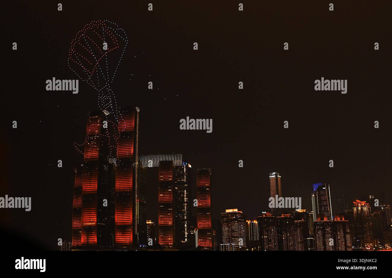 A drone light show illuminates the night sky in Chongqing, China, 24 ...