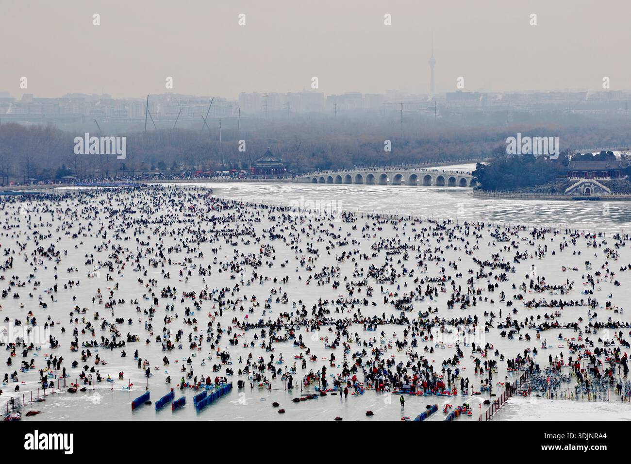Visitors crowd the ice rink at Beijing's Summer Palace, Beijing, China ...