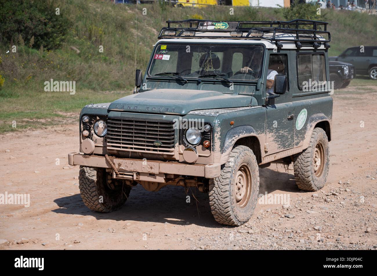 Front view of a classic Land Rover Defender short-wheelbase 4x4 in ...