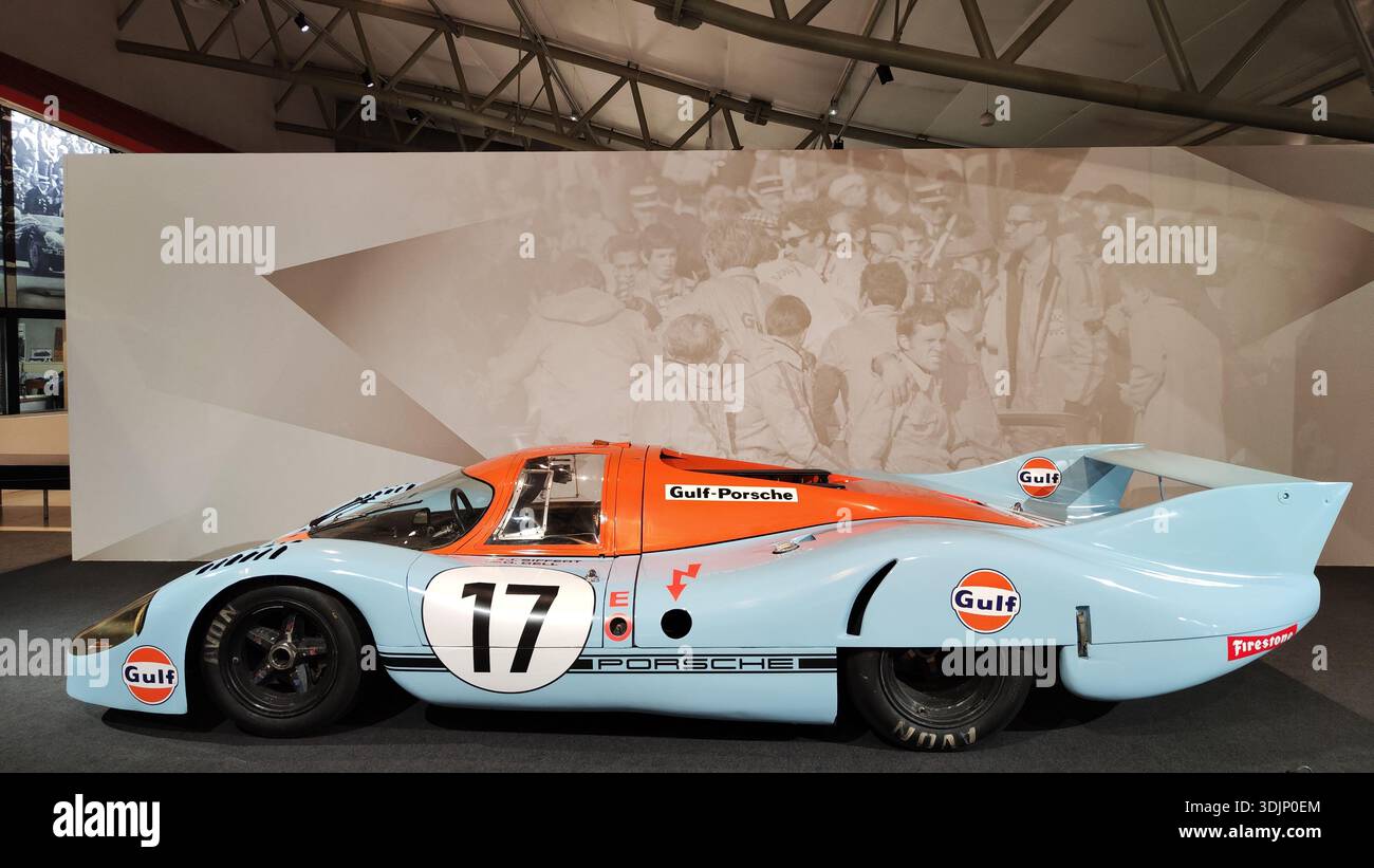 Side view of a historic blue and orange Gulf Porsche 917 LH racing car ...