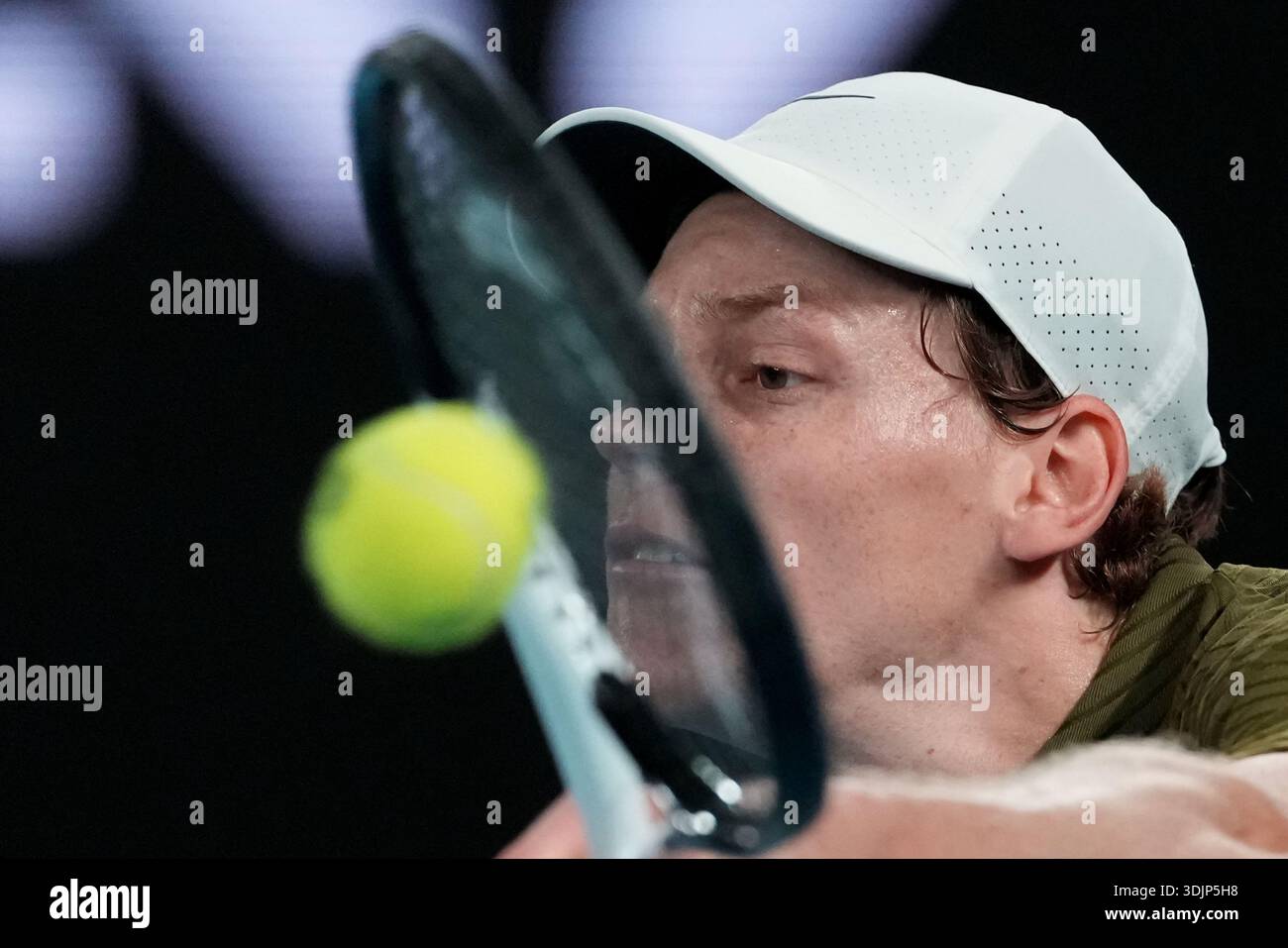 Jannik Sinner of Italy plays a backhand return to Ben Shelton of the U ...