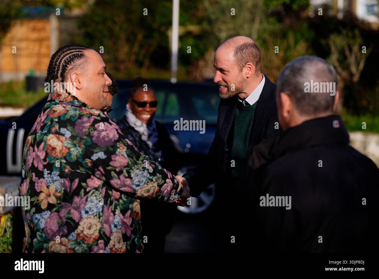 The Prince of Wales greets Alex Holmes (left), director at BBC Children ...